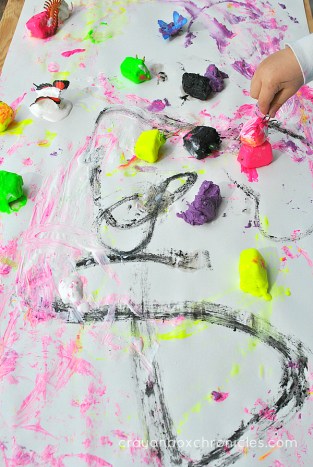 Melting Insect Sensory Painting – Crayon Box Chronicles